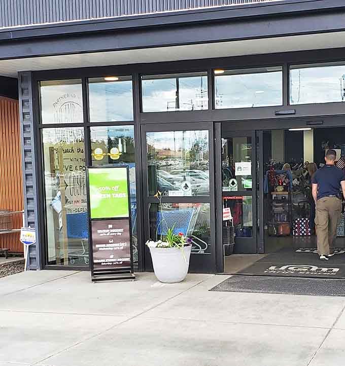 The welcoming entrance with its "50% off green tags" sign promises bargains before you even step inside&mdash;like a preview of the money-saving movie about to unfold.