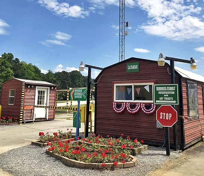 The rustic gatehouse welcomes bargain hunters with patriotic flair and flowering plants&mdash;your first clue this isn't ordinary shopping.