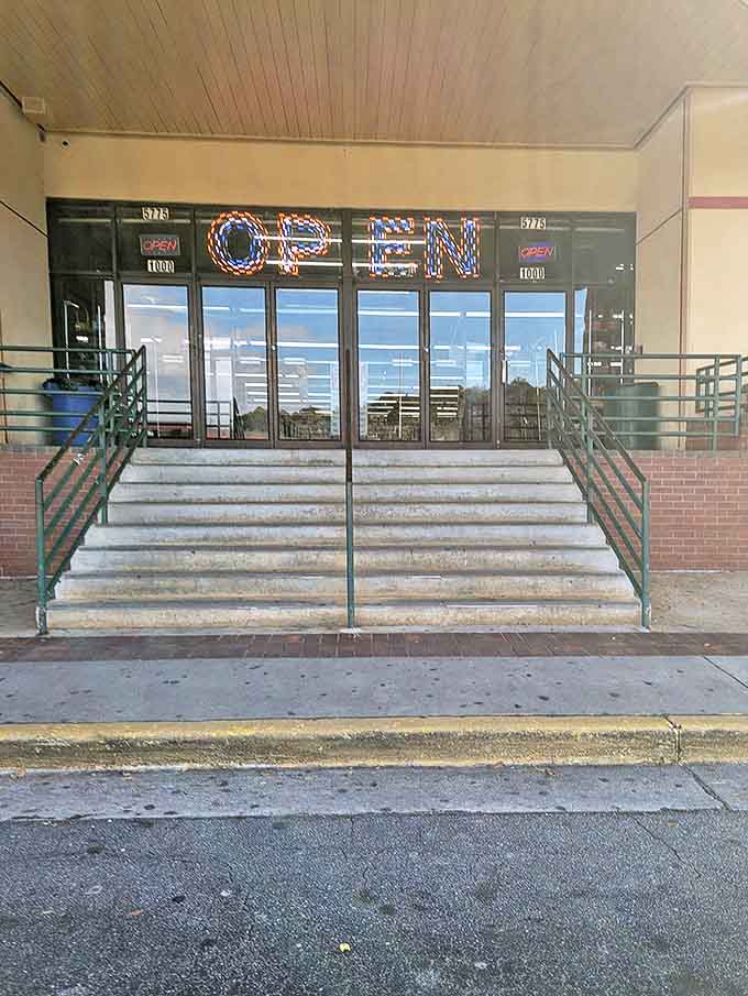 Those concrete steps might as well be the yellow brick road for bargain hunters. The neon "OPEN" sign flickers with all the allure of Vegas, but with much better odds.