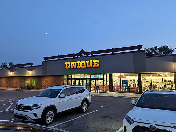 As dusk settles, Unique's illuminated façade transforms into a beacon of secondhand possibilities. Tomorrow's treasures await behind those glass doors.