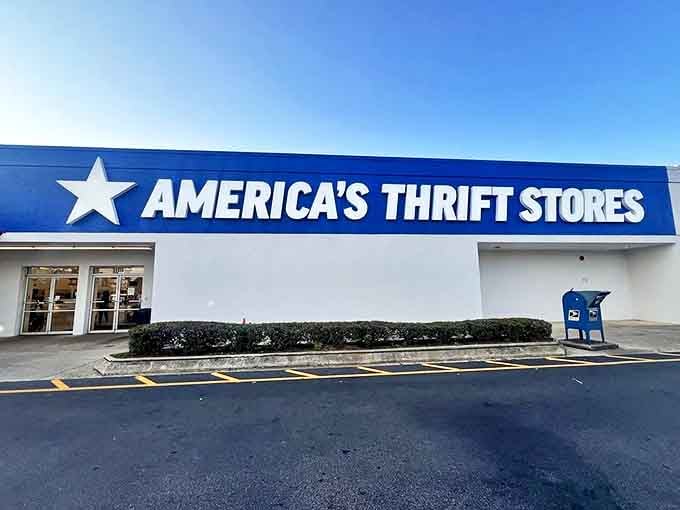 The star-spangled blue facade stands sentinel in the Alabama sun, a gateway to secondhand paradise.