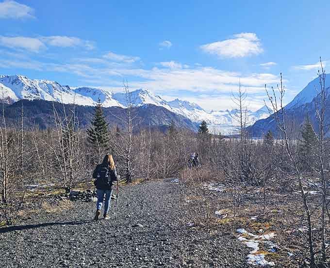 The trail beckons through a corridor of vibrant green, nature's version of the yellow brick road&mdash;except this one leads to actual magic.