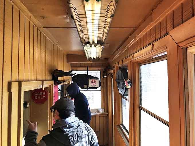 Inside, the narrow wooden corridor feels like stepping into a time machine. No frills, no fuss&mdash;just the serious business of barbecue.