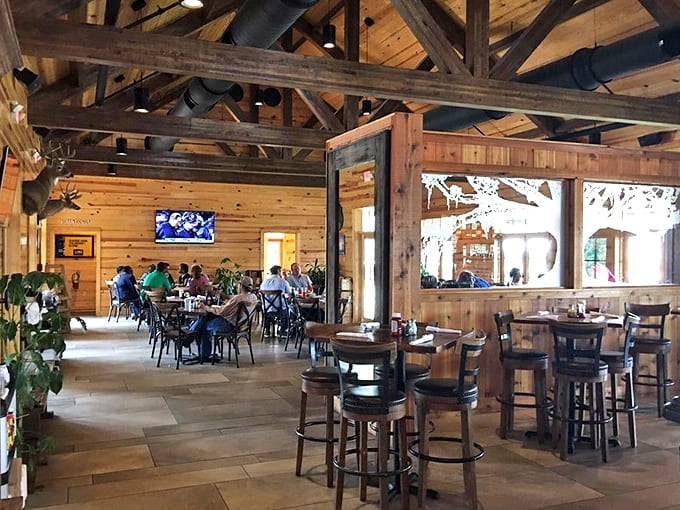 Exposed beams and natural wood create a dining room that feels both grand and intimate&mdash;like a Louisiana lodge that went to culinary school.
