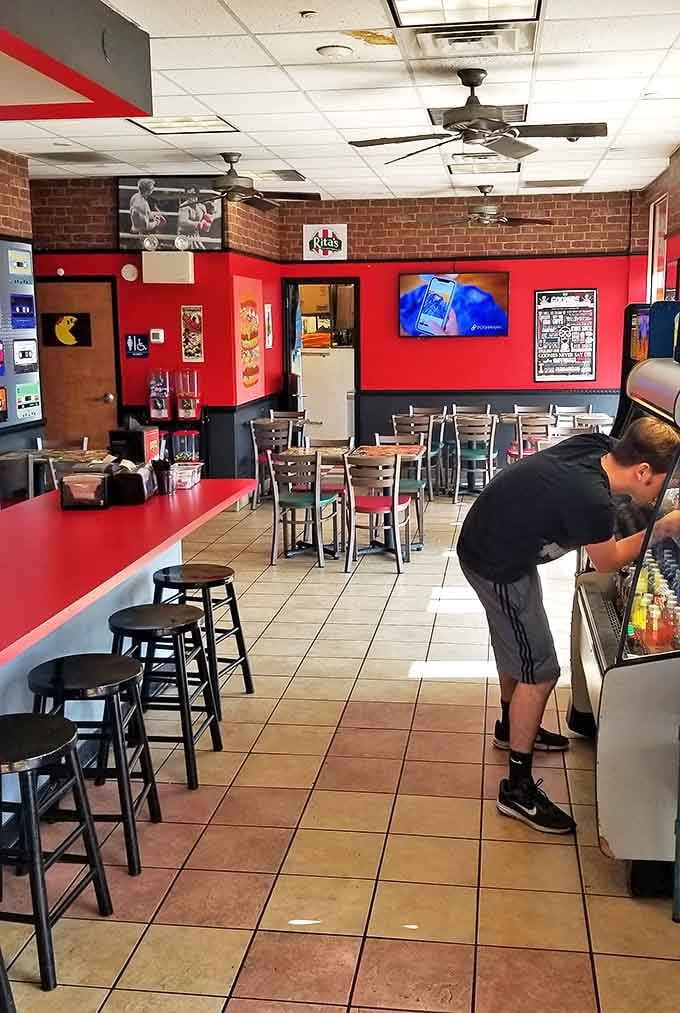 Red walls, brick accents, and nostalgic memorabilia create the perfect backdrop for burger bliss&mdash;no fancy frills, just an atmosphere primed for serious eating.