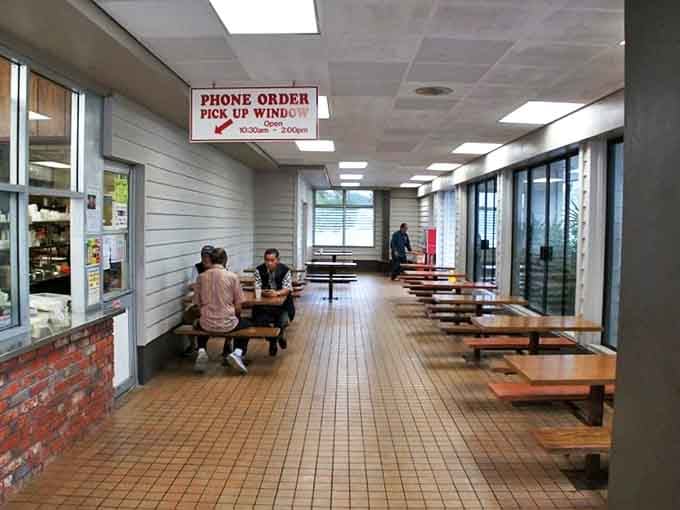 Inside, picnic-style tables and no-nonsense decor tell you everything you need to know: this place is about the food, not the frills.