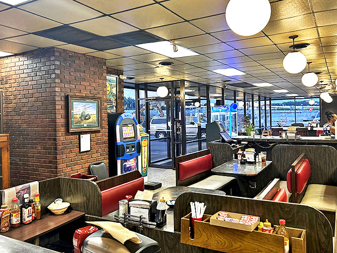 Classic diner aesthetics done right &ndash; red vinyl booths, globe lighting, and that unmistakable feeling that you've just stepped into a place where calories don't count.