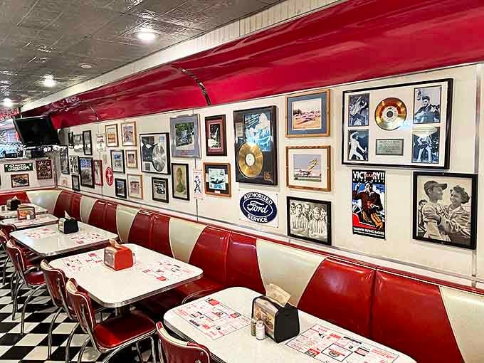 Red vinyl booths, checkered floors, and walls adorned with golden oldies memorabilia&mdash;this isn't decoration, it's a full-immersion nostalgia bath.