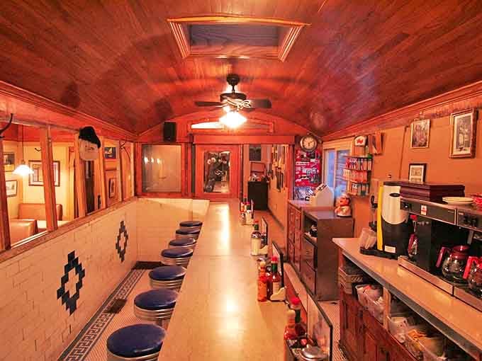 Step inside and you're transported to breakfast nirvana – a narrow counter with blue stools beneath a curved wooden ceiling.