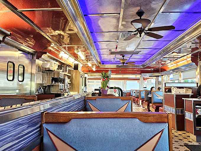 Classic Americana in every corner—where the ceiling fans spin stories overhead and those blue vinyl booths have cradled hungry Delawareans for generations.