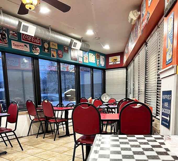 Red vinyl chairs and checkerboard tables &ndash; the universal language of "the food here is so good, we don't need fancy decor."