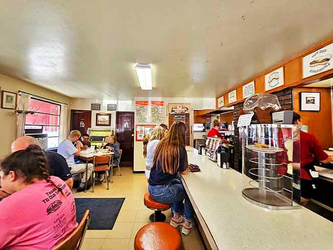 Inside Mickey-Lu's, time stands deliciously still. The counter seating puts you front-row for the sizzle-and-flip show that's been running longer than most Broadway hits.