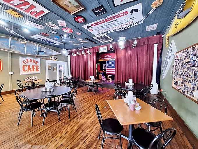 Step inside and you're greeted by wooden floors that have witnessed decades of conversations and countless coffee refills. The ceiling's memorabilia collection tells stories all its own.