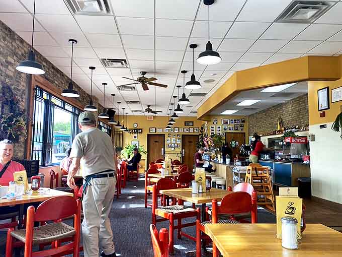 Inside Maria's, the warm yellow walls and red chairs create the perfect backdrop for breakfast epiphanies. This isn't just a meal&mdash;it's morning theater.