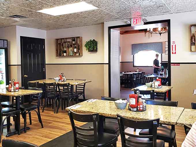 Inside, granite-topped tables and warm wood tones create that perfect "neighborhood joint" atmosphere. It's like breakfast at your favorite aunt's house&mdash;if your aunt were a breakfast wizard.