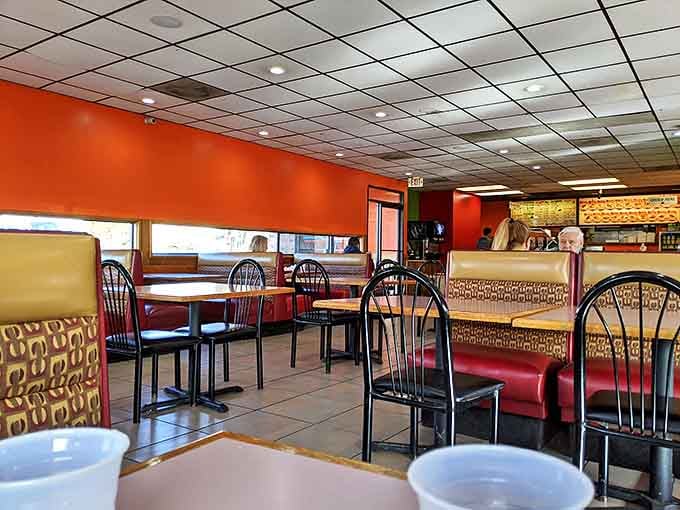 The vibrant orange walls and patterned booths aren't trying to impress Architectural Digest&mdash;they're too busy setting the stage for flavor that speaks volumes.