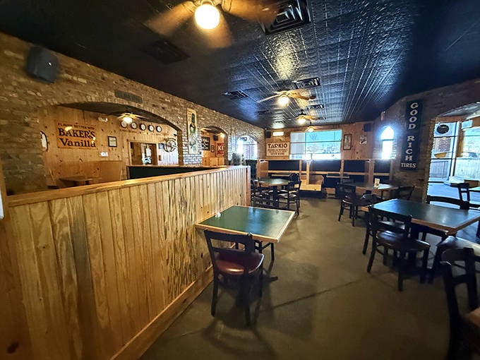 Rustic wooden panels and exposed brick create that perfect "come as you are" atmosphere where college memories and pizza dreams are equally at home.