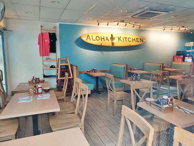 Inside, the surfboard sign and turquoise walls create that perfect "I've discovered something special" vibe that makes you feel like a culinary detective.