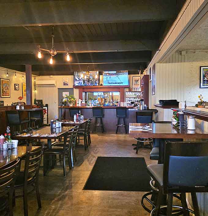 Inside Mandy's, warm wood tones and simple lighting create that perfect diner atmosphere where conversations flow as freely as the coffee. Comfort begins before the food arrives.