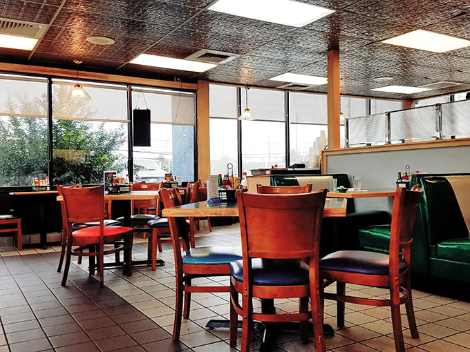 Inside, the classic diner aesthetic with its decorative tin ceiling and comfortable seating invites you to settle in for a meal that feels like coming home.