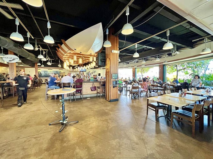 Inside, concrete floors and wooden beams create an atmosphere where the food, not the decor, takes center stage.
