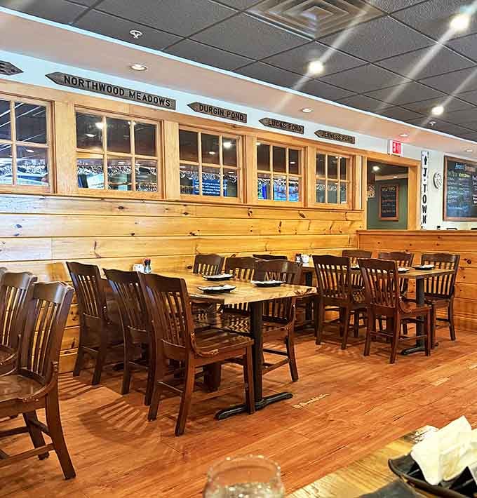 Warm wood paneling and sturdy chairs create that perfect balance of rustic comfort and dining elegance&mdash;like a hug from your favorite aunt.