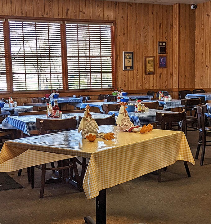 Wood-paneled walls and yellow and blue checkered tablecloths create the perfect backdrop for serious eating&mdash;no Instagram filters required, just honest-to-goodness comfort.
