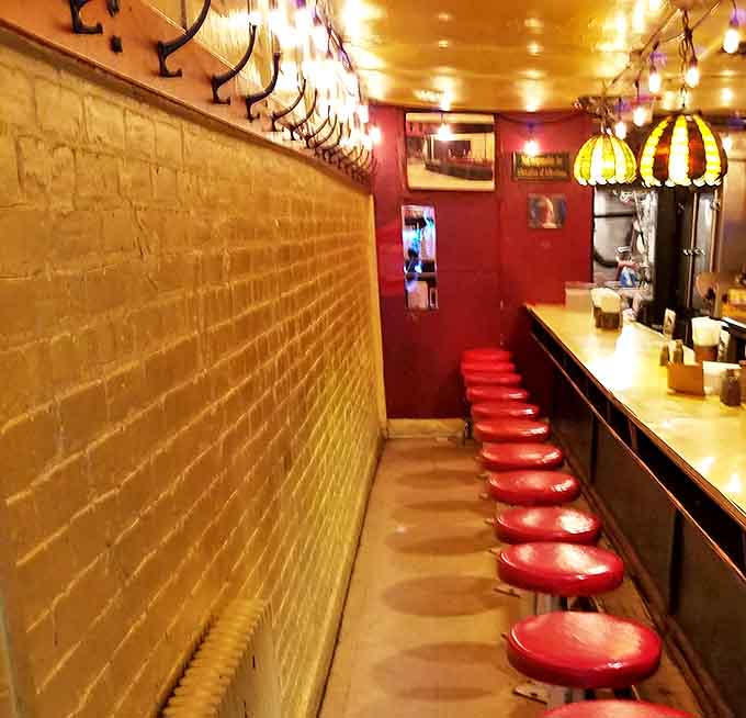 Like dining in a delicious hallway, Al's narrow interior features a row of red stools where strangers become friends over coffee and pancakes.