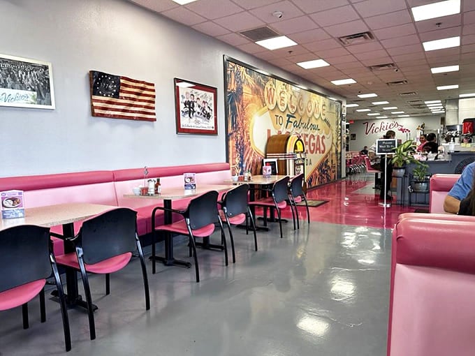 Pink booths that have cradled more Vegas stories than a casino dealer, with a mural that reminds you exactly where you are &ndash; as if you could forget.