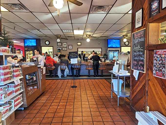 The bustling interior reveals the breakfast ballet in full swing, where servers navigate the terra cotta tiles with the grace of dining room dancers.