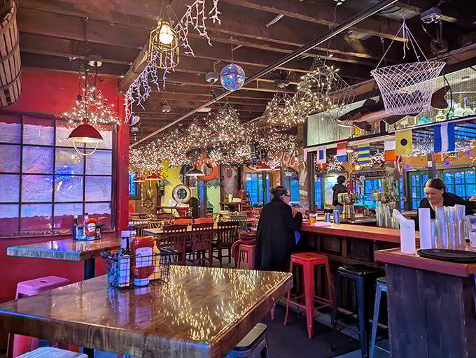 Fishing nets and twinkling lights create a magical maritime wonderland inside. It's like Christmas met a fisherman's wharf and decided to stay awhile.
