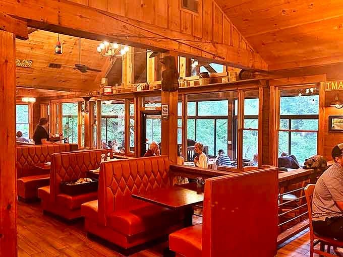 Warm pine walls and burgundy booths create the perfect mountain cabin vibe &ndash; like dining in a Norman Rockwell painting with better cocktails.