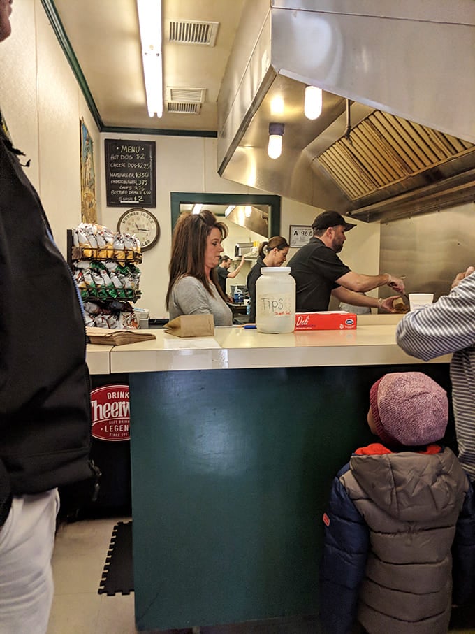 Where culinary magic happens in a space barely wider than your arms. Somehow, that makes the burgers taste even better.