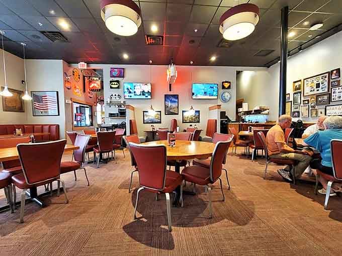 Inside, comfortable seating and warm wood tones create that perfect "everybody knows your name" atmosphere where conversations flow as freely as the coffee.