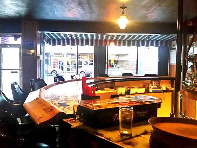 Step inside and time stands still&mdash;dark wood, intimate lighting, and bar stools that have heard decades of Anchorage stories.