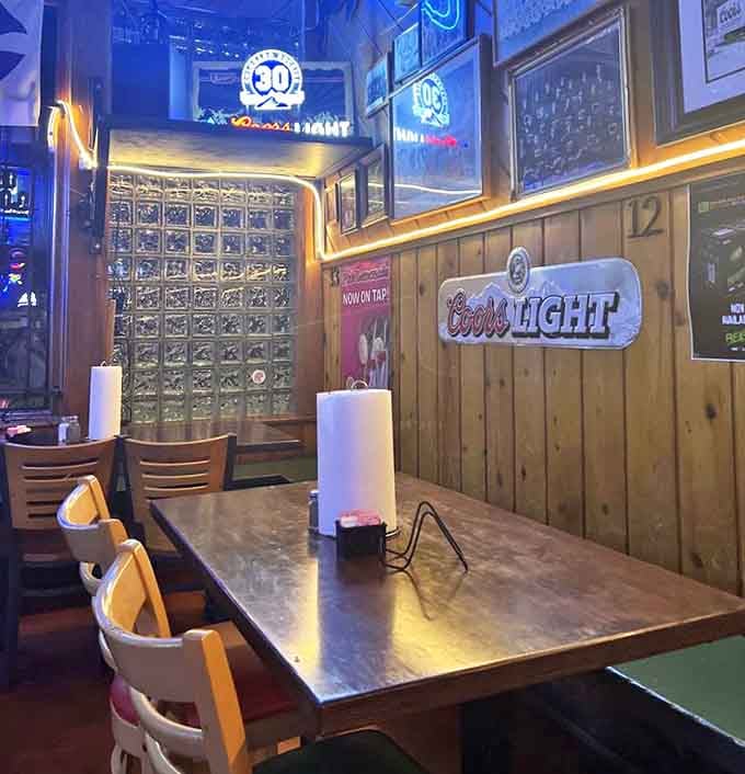 Glass blocks meet Coors nostalgia in this cozy corner where countless Sloppers have met their delicious demise.