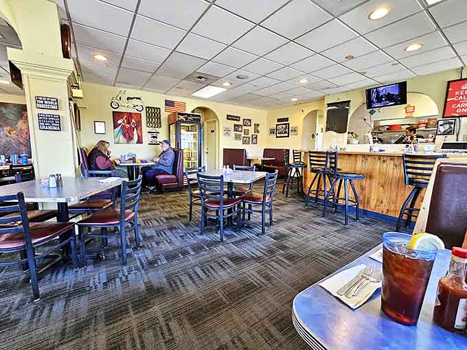 Inside, the warm yellow walls and wooden counter create that perfect "everybody knows your name" vibe, minus the bar stools and plus the pancakes.