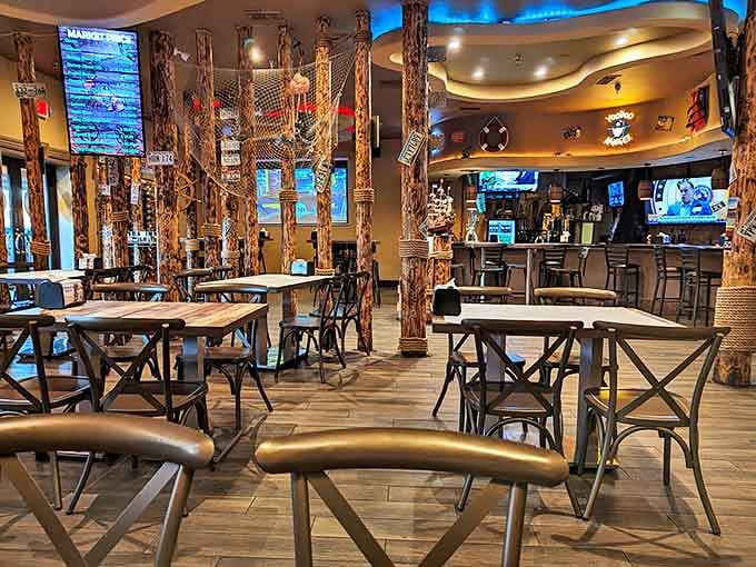 Nautical charm meets desert dining. Those wooden posts wrapped in fishing nets aren't just decoration&mdash;they're setting the stage for your maritime feast.