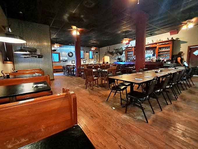 Step inside to discover wooden floors that have hosted generations of diners, rustic tables, and an atmosphere that whispers, "Take your time, the steak is worth waiting for."