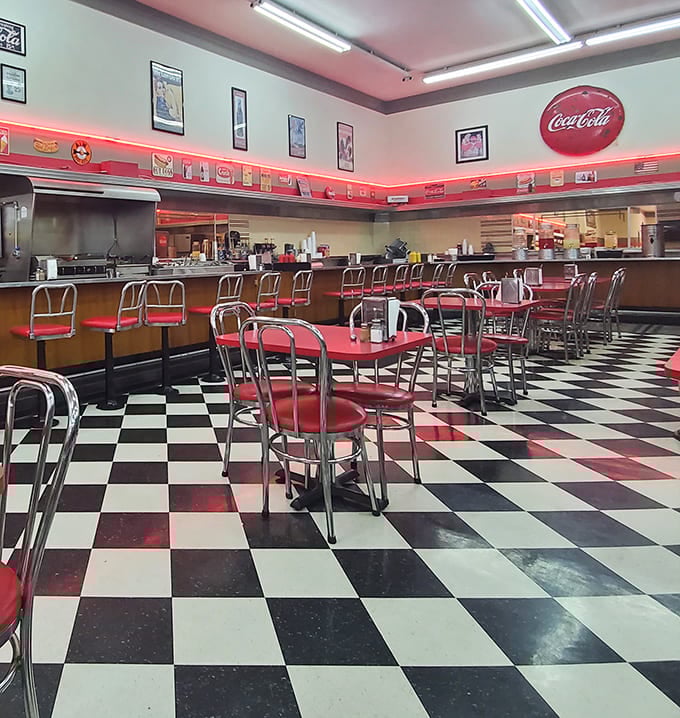 Step inside and suddenly it's 1955 again—red vinyl stools, checkerboard floors, and a counter that's witnessed decades of first dates and family outings.