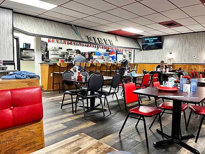 Classic diner aesthetics done right—red vinyl booths, counter seating, and that unmistakable buzz of morning conversations. Breakfast theater at its finest.