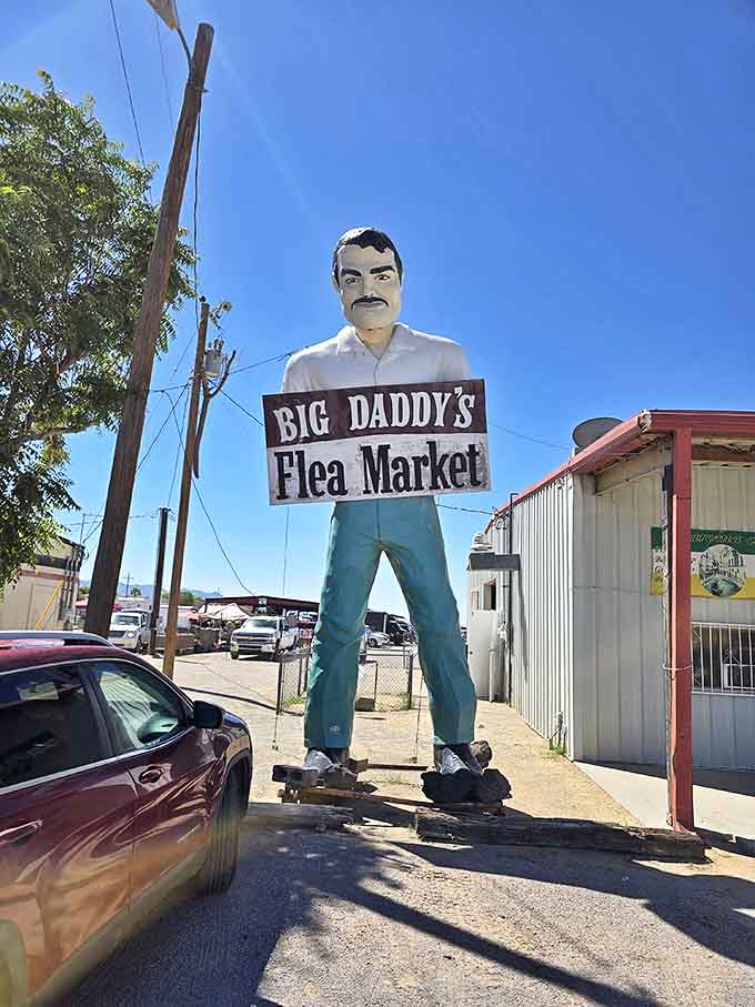 The iconic mustachioed sentinel stands guard, a fiberglass ambassador welcoming bargain hunters to this Las Cruces institution.