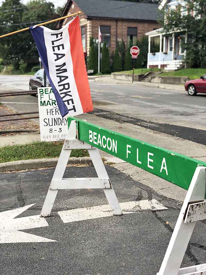 The red, white, and blue flag flutters like a patriotic semaphore, signaling to bargain hunters: "Your next conversation piece is waiting here!"