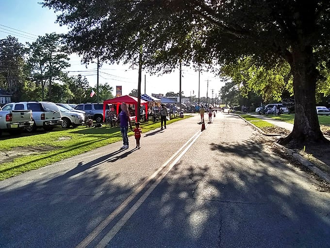 Community gatherings under ancient oaks&mdash;where neighbors become family and a dollar still buys genuine conversation.