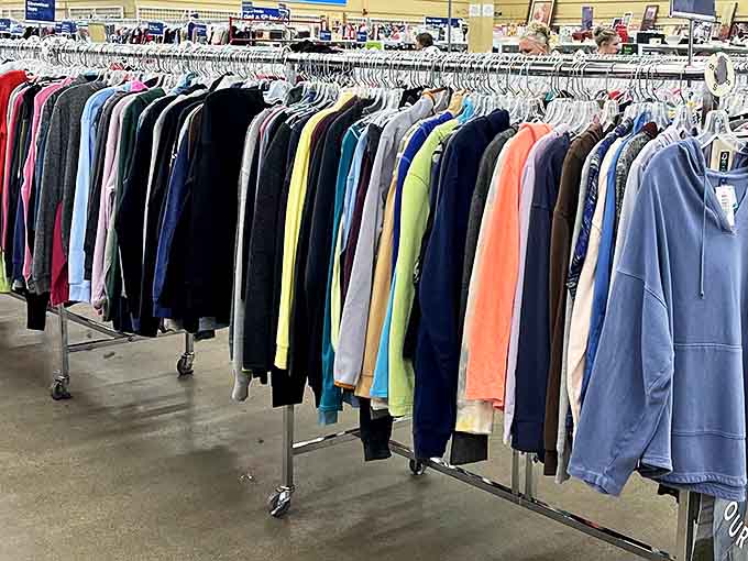 A rainbow coalition of sweatshirts stands at attention, each one with stories to tell and warmth to offer at a fraction of retail prices.