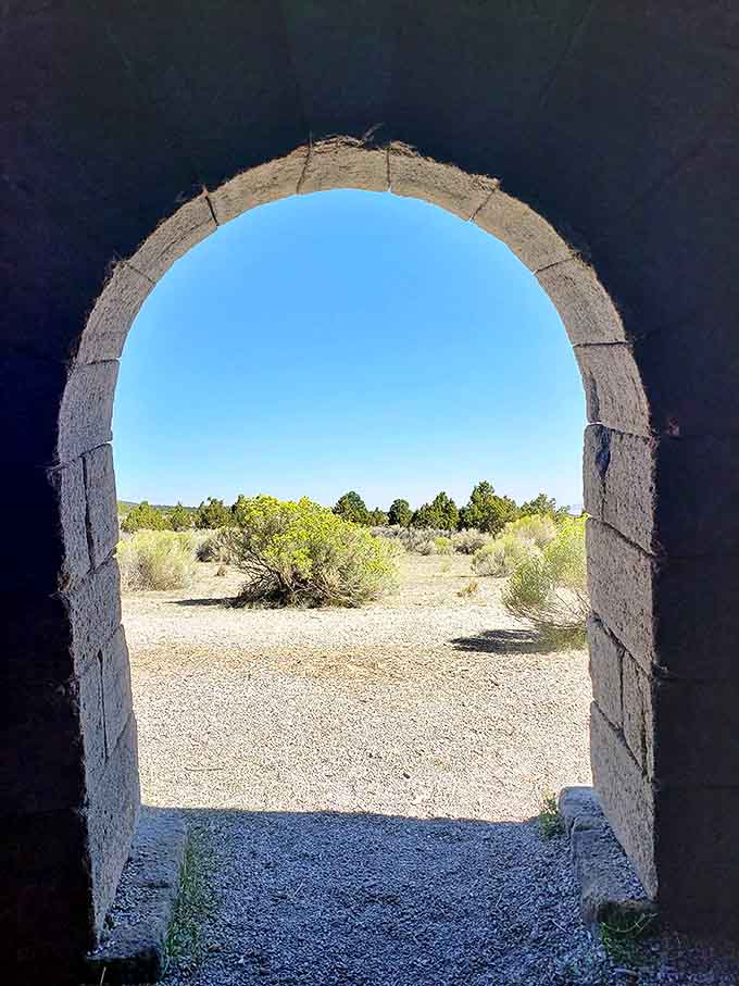 Framing the endless desert through ancient stone&mdash;it's like looking through a portal to Nevada's rugged past.