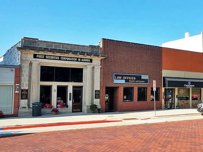Aurora's historic First Securities building stands proud, a limestone sentinel guarding memories of bygone banking days.