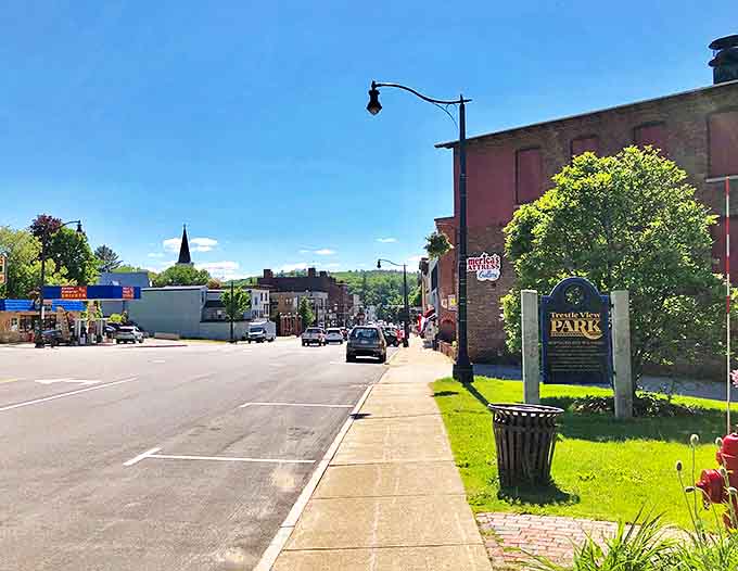 Franklin's Main Street whispers stories of simpler times, where brick buildings stand proud against New Hampshire's blue skies.