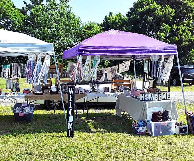 Welcome signs and dreamcatchers beckon under a purple canopy &ndash; this outdoor vendor at Strawtown Flea Market knows how to create curb appeal!