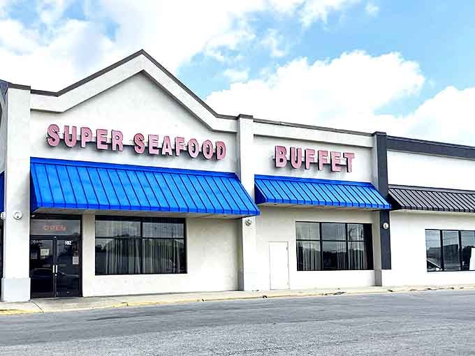 Bold red letters and bright blue awnings announce a seafood lover's paradise. Your diet plan's kryptonite awaits inside.